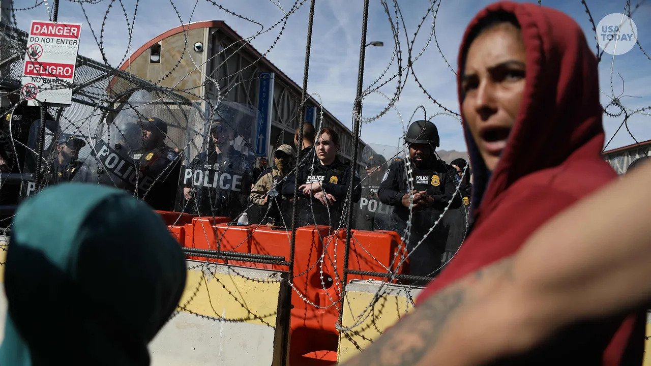 Border standoff: US officials in riot gear clash with migrants ...